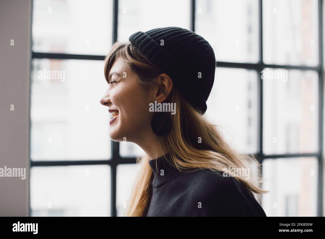Businesswoman at window hi-res stock photography and images - Alamy