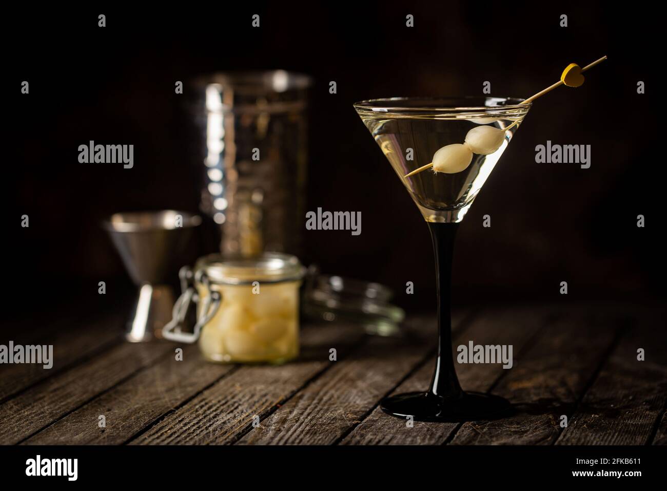 Gibson alcohol cocktail with martini and onions in martini glass ...