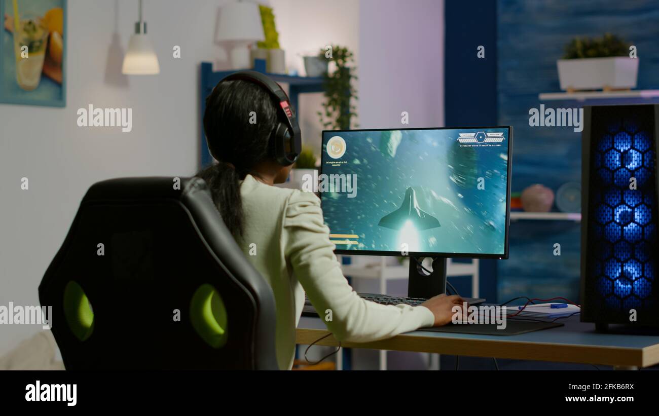 Professional eSport gamer putting headset before playing in competitive ...