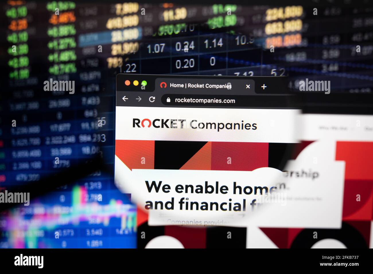 Rocket companies company logo on a website with blurry stock market ...