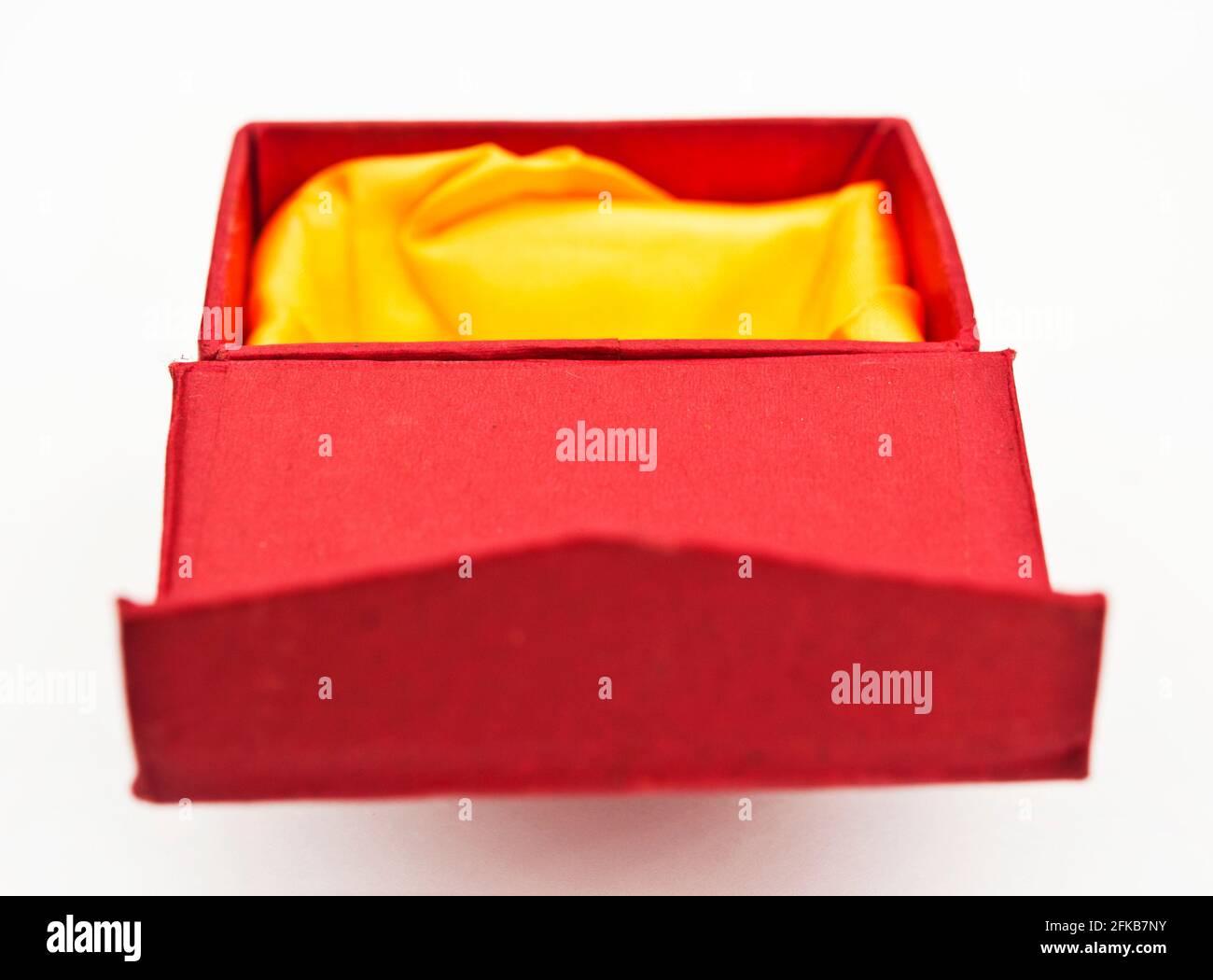 open red box satin lined yellow inside Stock Photo - Alamy