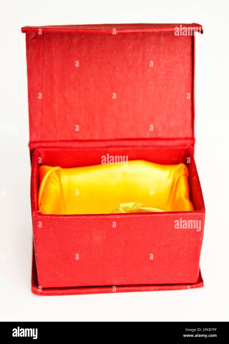 open red box satin lined yellow inside Stock Photo - Alamy