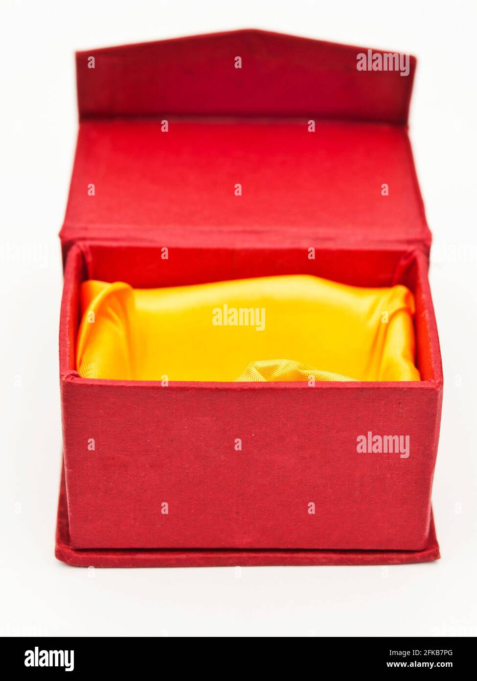 open red box satin lined yellow inside Stock Photo - Alamy