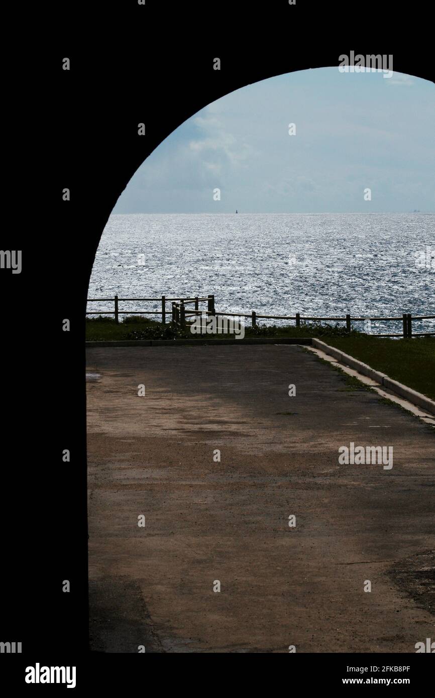 ocean view with arch shadow and parking Stock Photo - Alamy