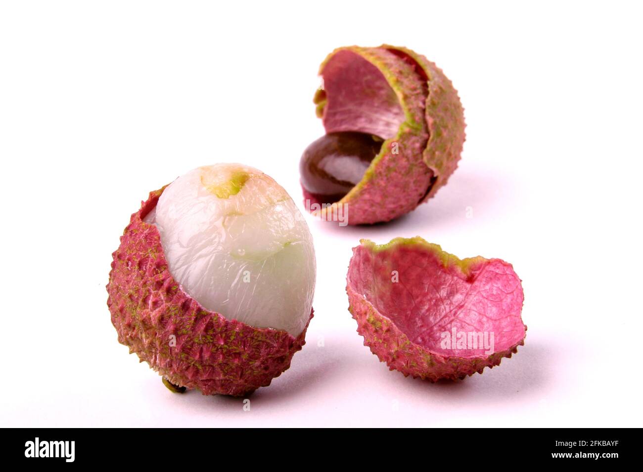 litchi (Litchi chinensis), opened fruit with seed Stock Photo - Alamy