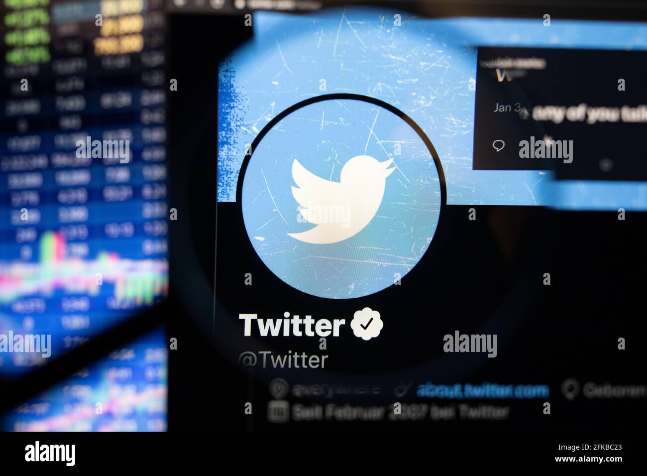 Twitter company logo on a website with blurry stock market developments ...