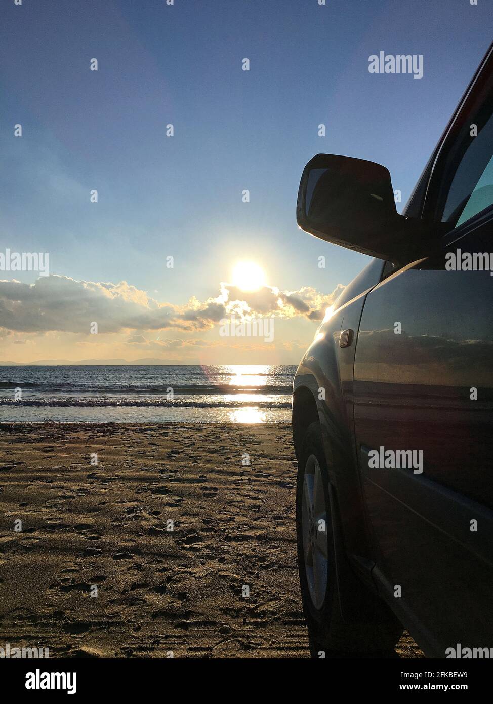Off road car at the beach before sunset Stock Photo - Alamy
