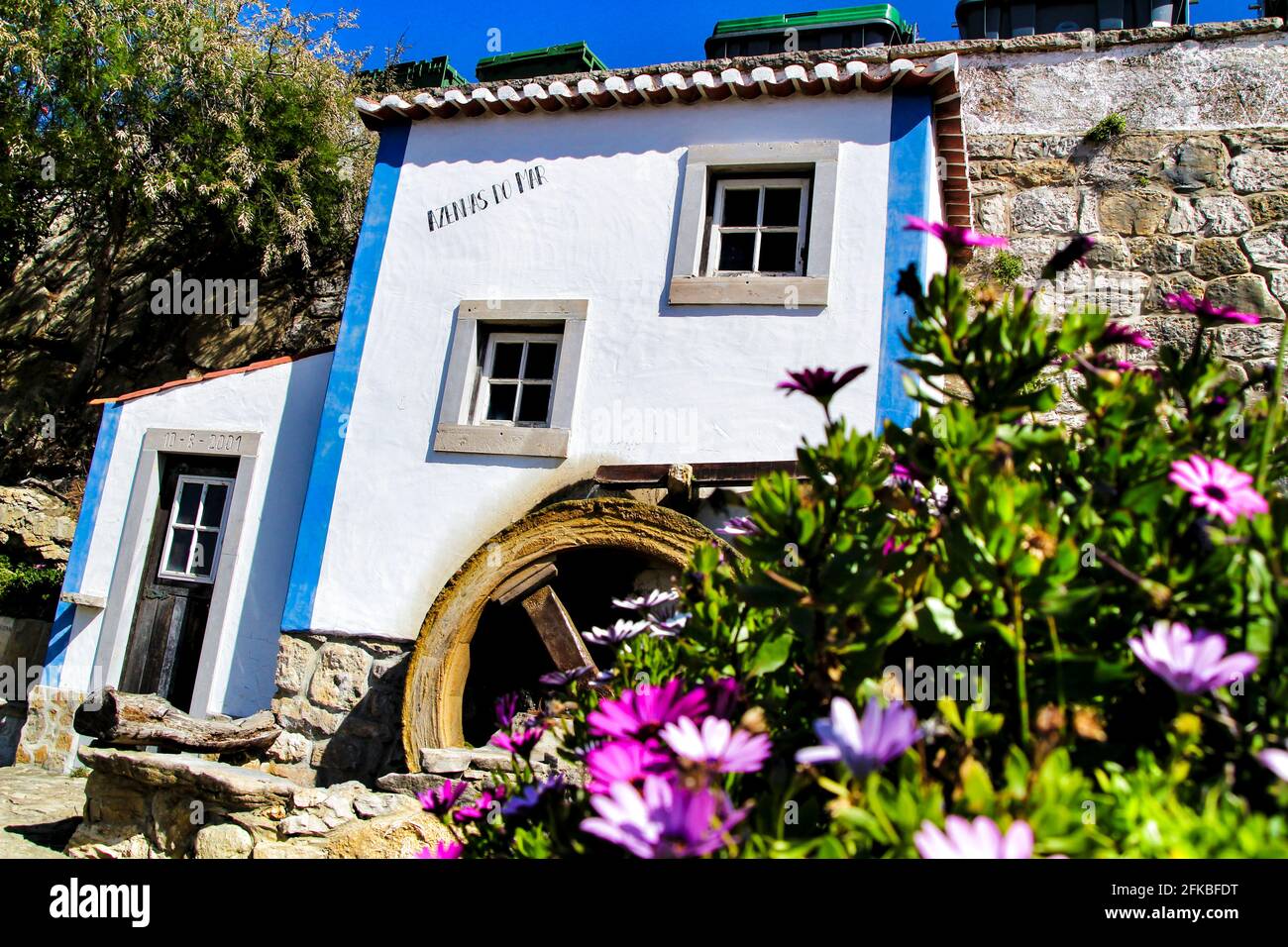 Beautiful and colorful waterwheel in Azenhas do Mar in Lisbon, Portugal ...