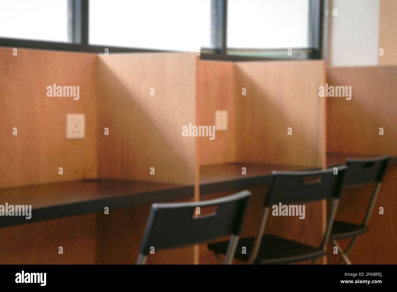 Library cubicles with power outlet. Defocused, blurred effect for ...