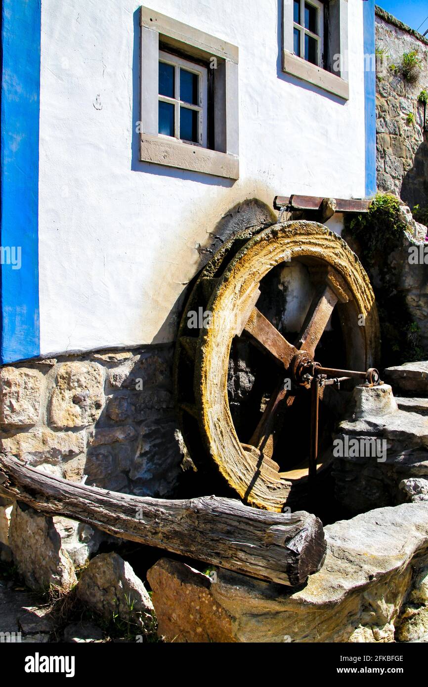 Beautiful and colorful waterwheel in Azenhas do Mar in Lisbon, Portugal ...