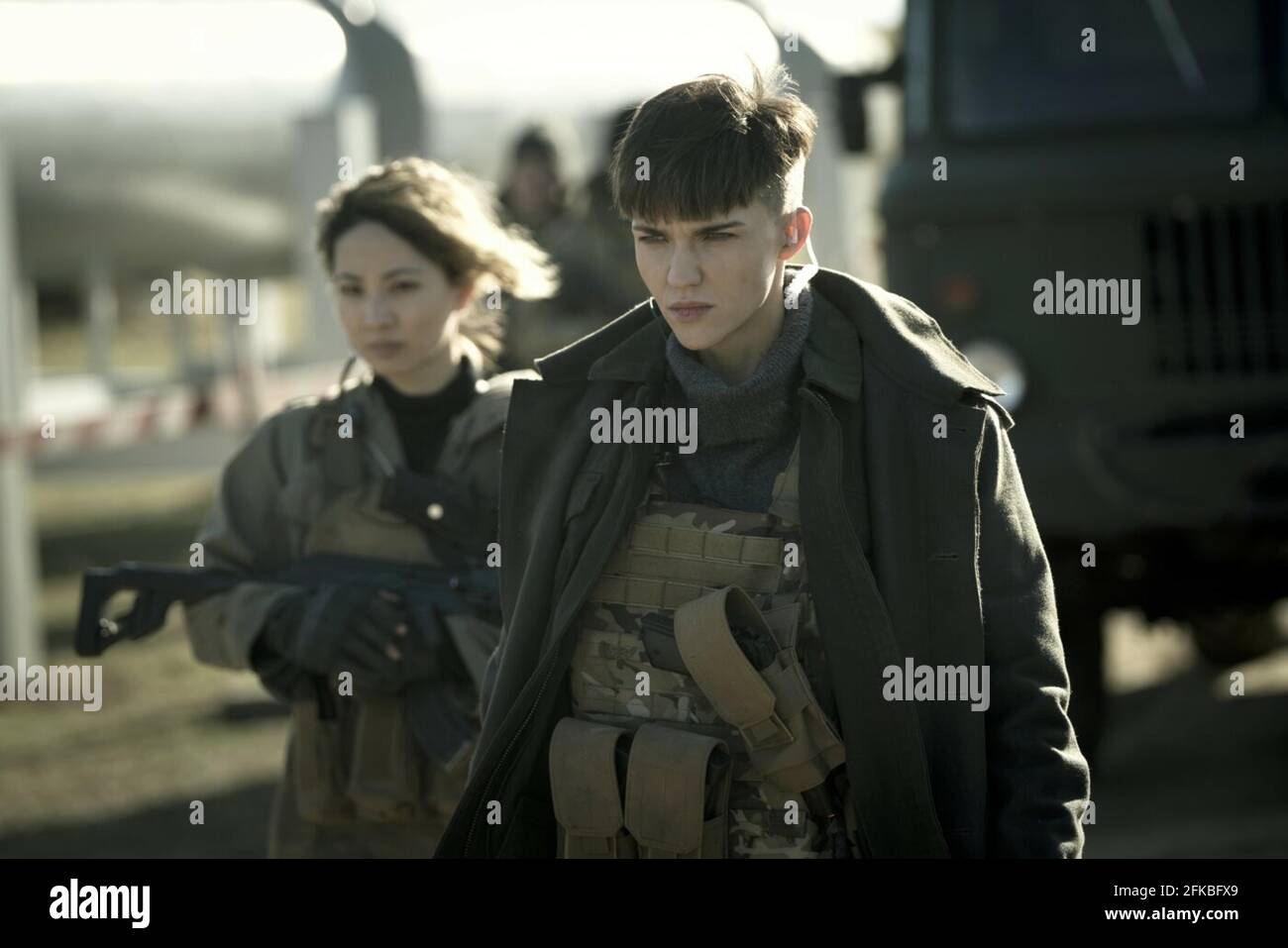 SAS: RED NOTICE (2021) RUBY ROSE (RIGHT) MAGNUS MARTENS (DIR) VERTICAL ...