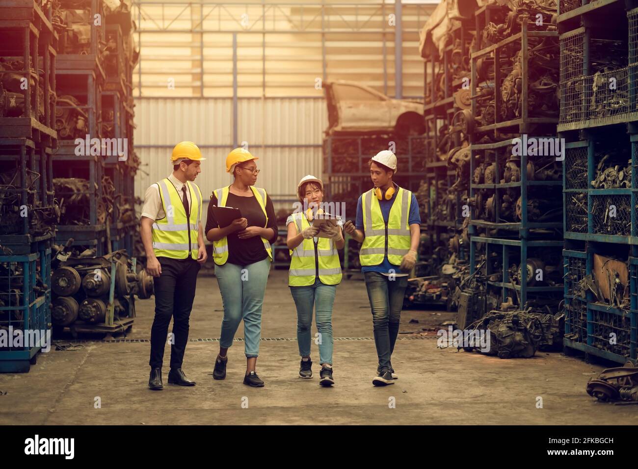 Group of Teamwork Worker mix race enjoy team working in heavy industry ...
