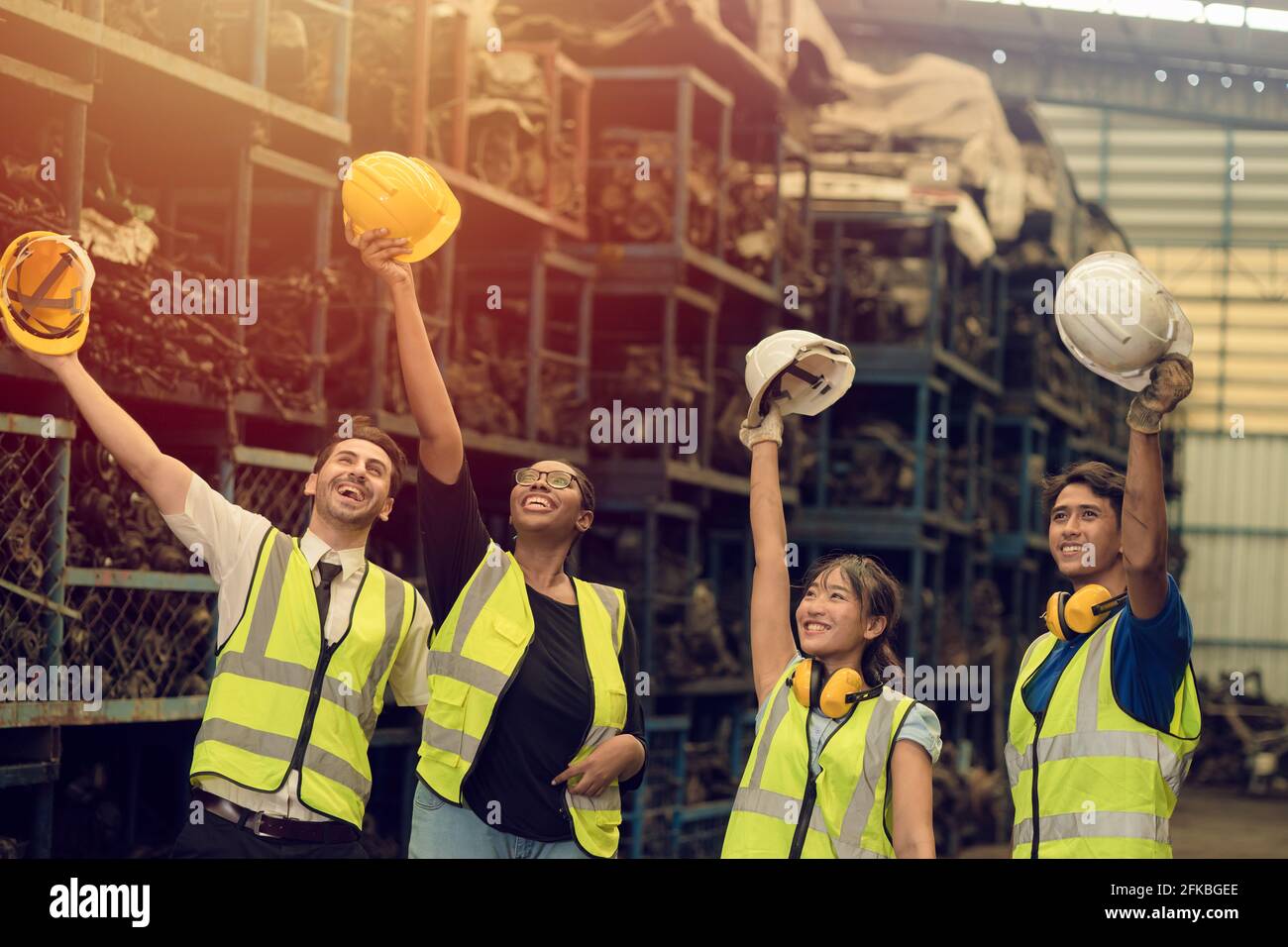 Group of Teamwork Worker mix race enjoy team working in heavy industry ...