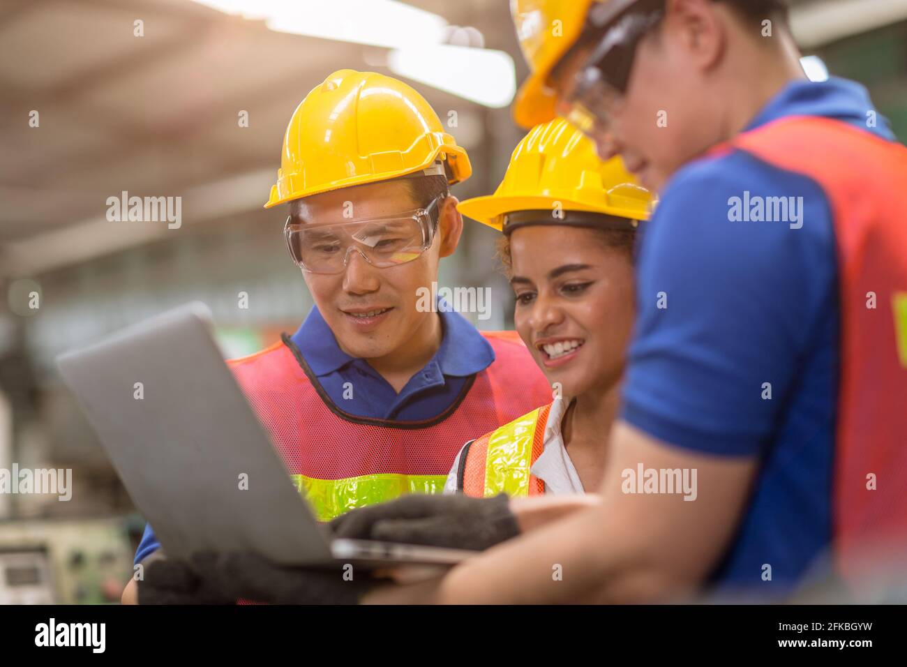 engineer women working with male team mix race work help together in ...