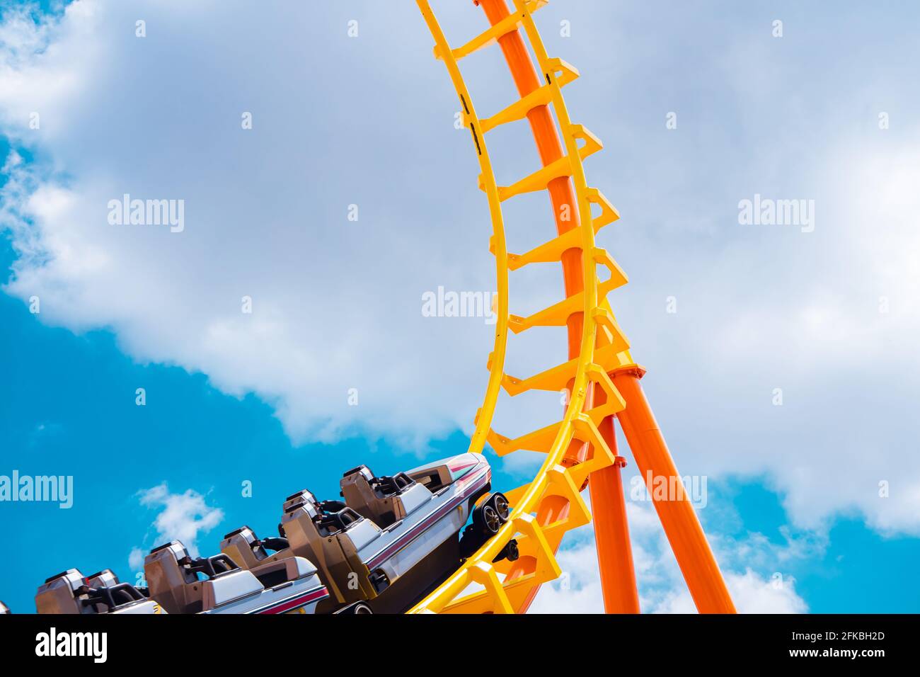 roller coaster high in the summer sky at theme park most excited fun ...