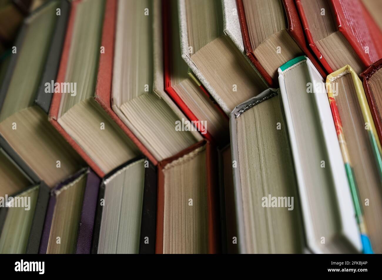 Stack of books background. many books piles. Stack of Books of ...
