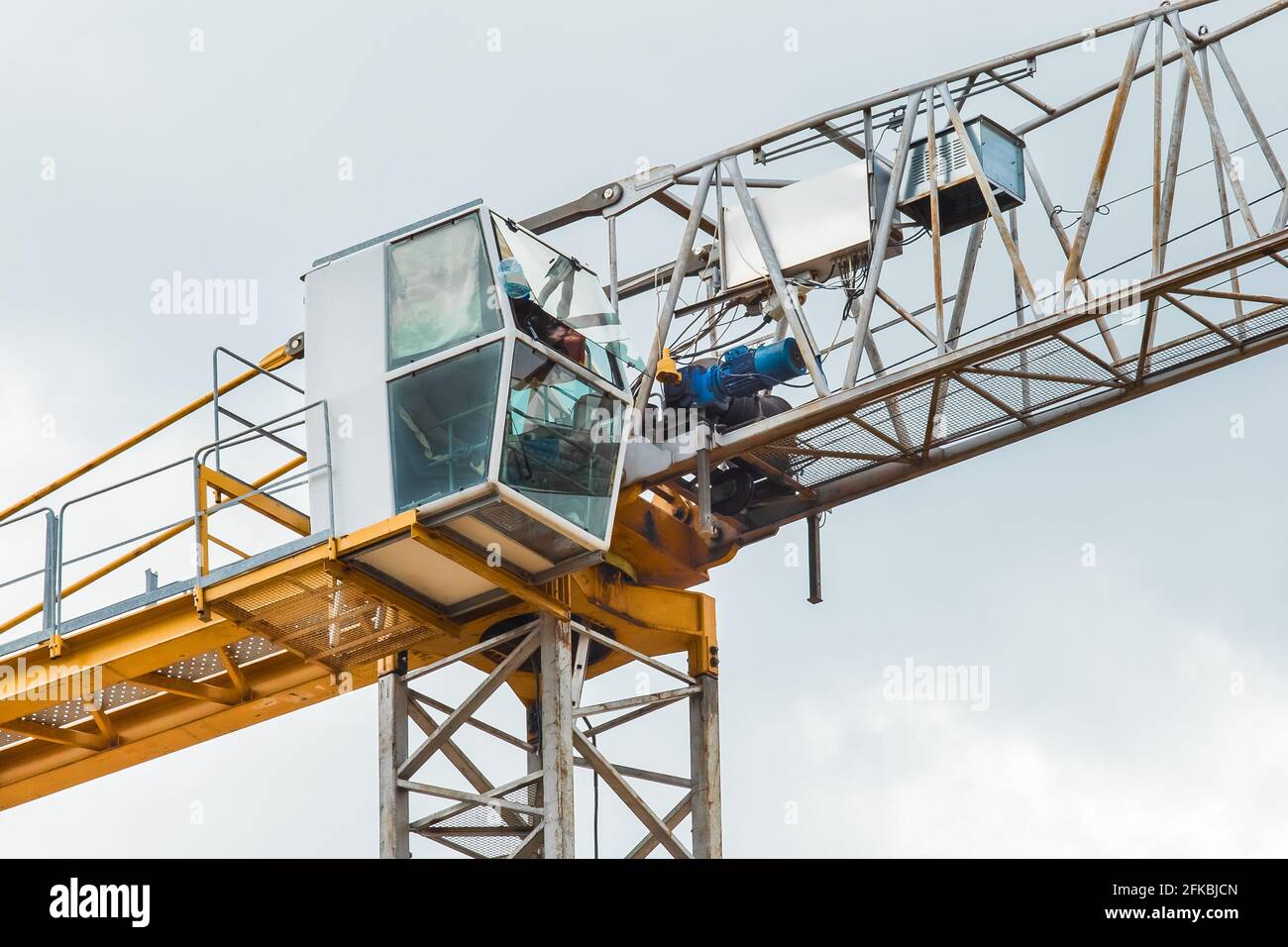 Tower equipment industrial crane cabin close-up on sky background or ...