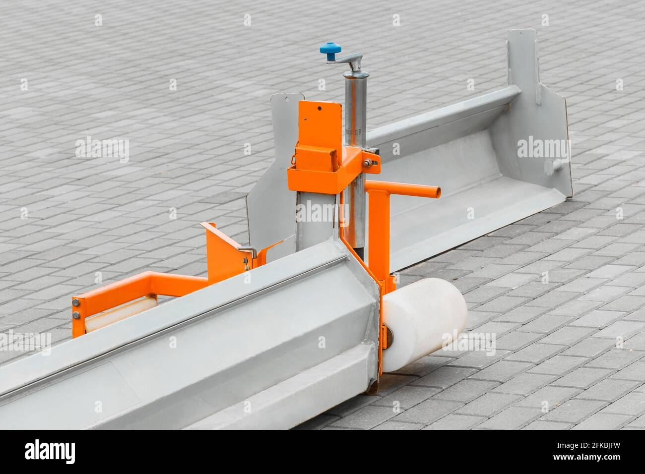 Part of industrial equipment for leveling hard-surfaced surfaces ...