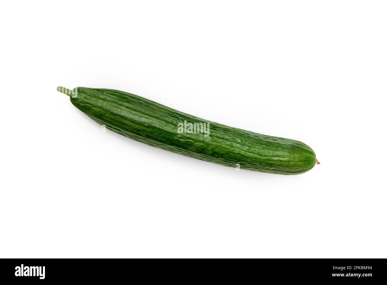 One whole cucumber on a white background Stock Photo - Alamy