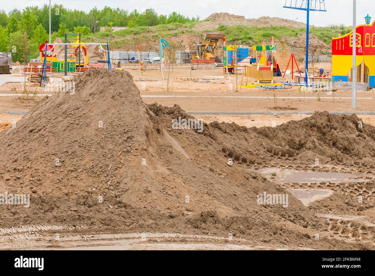 A pile of sand nature material at a construction site. Reconstruction ...