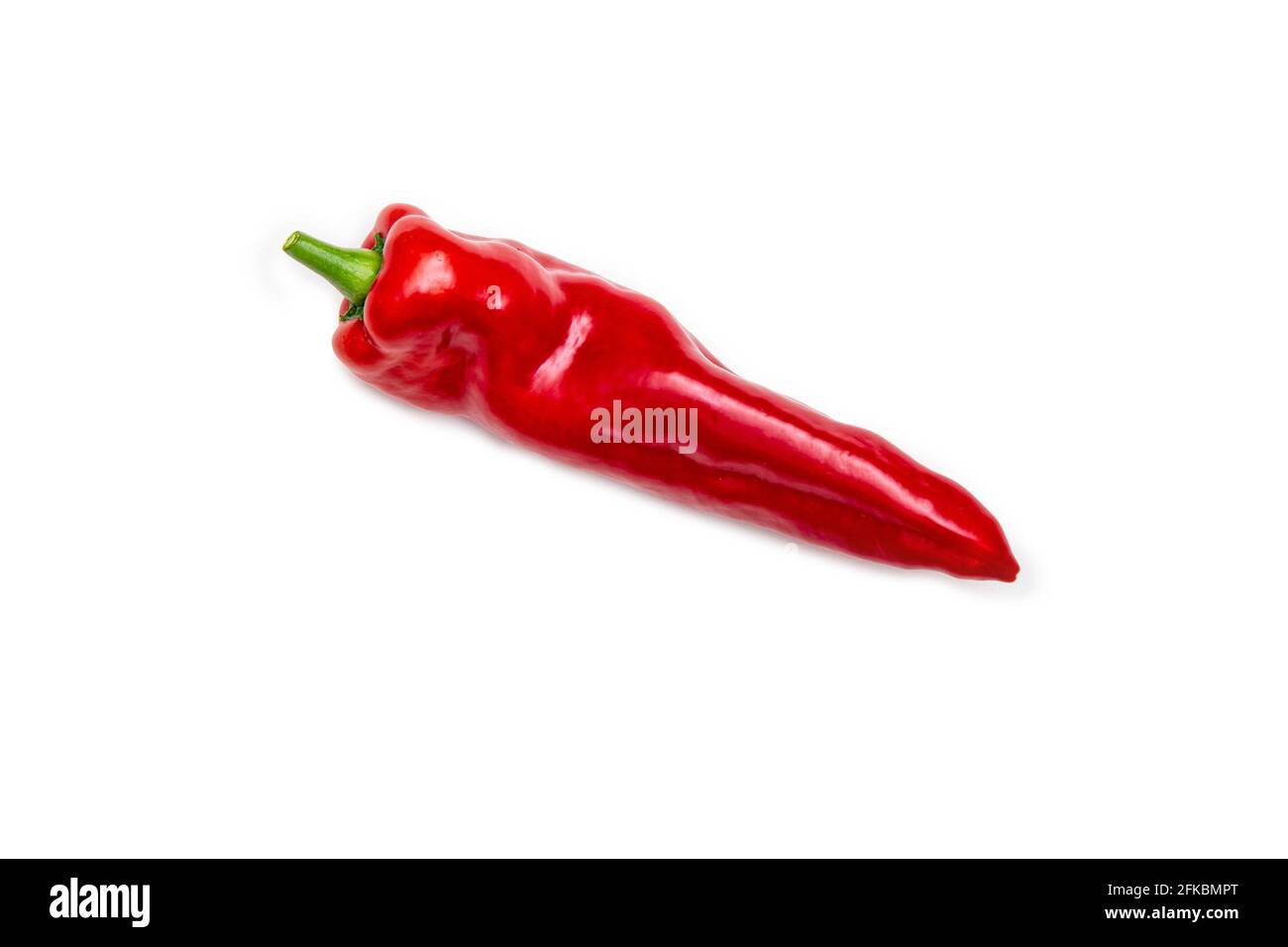 Long sweet red pepper on a white background Stock Photo - Alamy