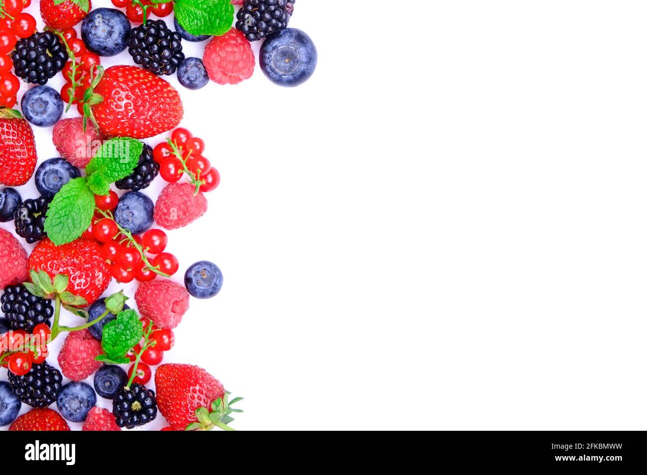 Bunch of mixed berries in harvest pile on white background. Colorful ...