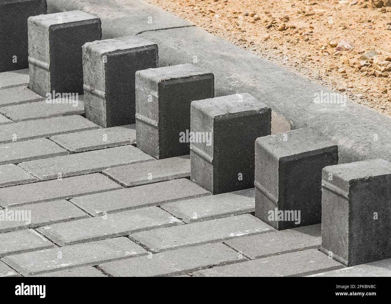 Laying floor tile sidewalk urban road or repairing paving stone slabs ...