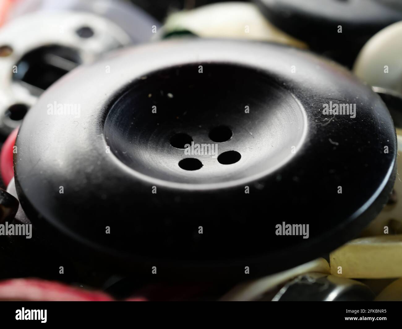 Collection of assorted spare clothes buttons. Macro. DOF Stock Photo ...