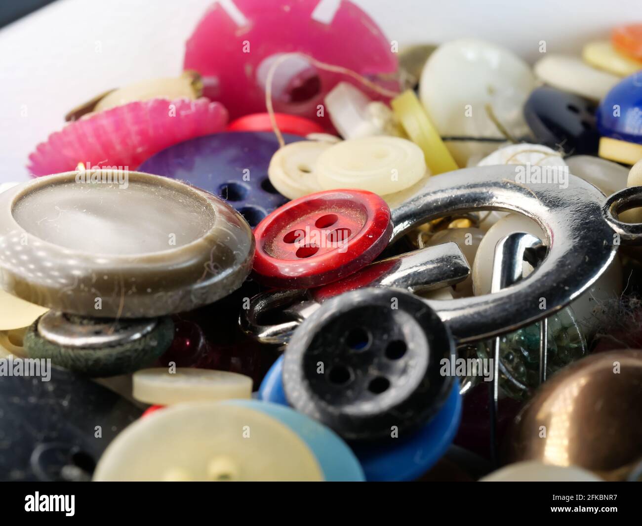 Collection of assorted spare clothes buttons. Macro. DOF Stock Photo ...