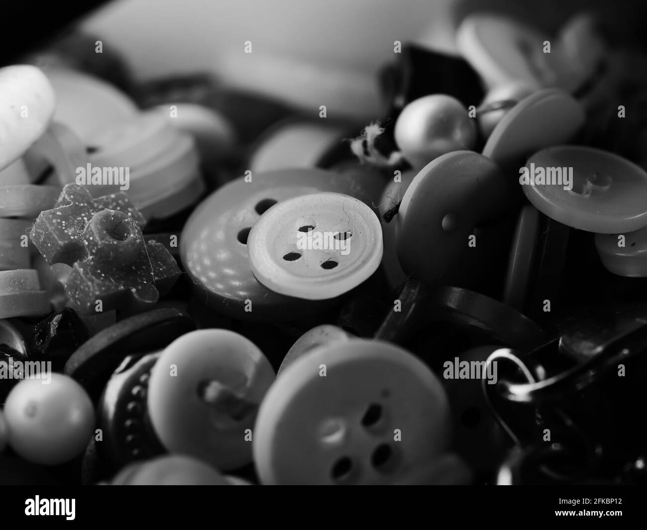 Collection of assorted spare clothes buttons. Macro. DOF Stock Photo ...