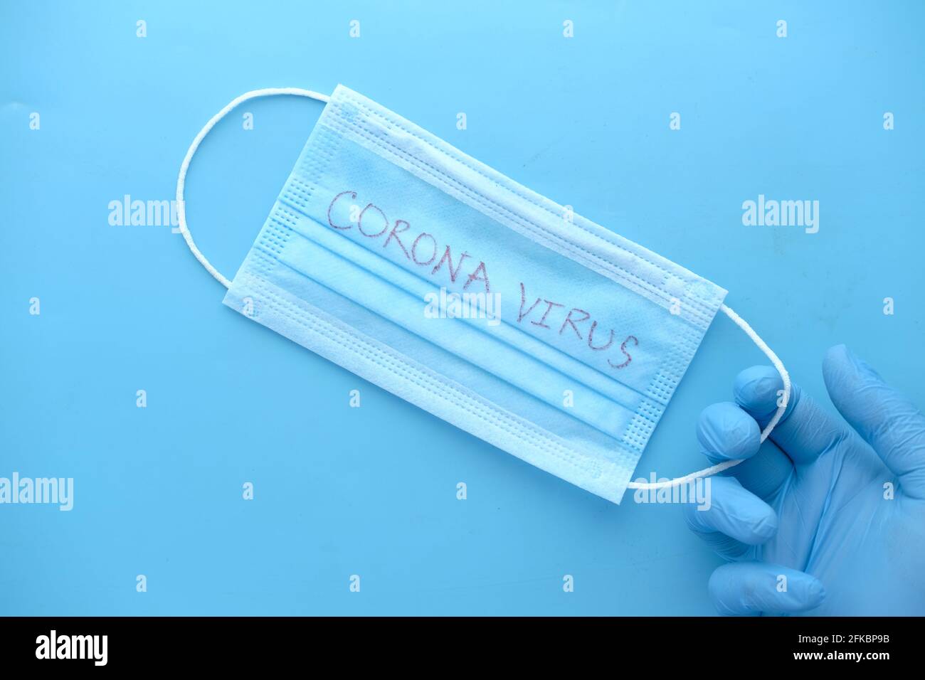 Hand face mask word hi-res stock photography and images - Alamy