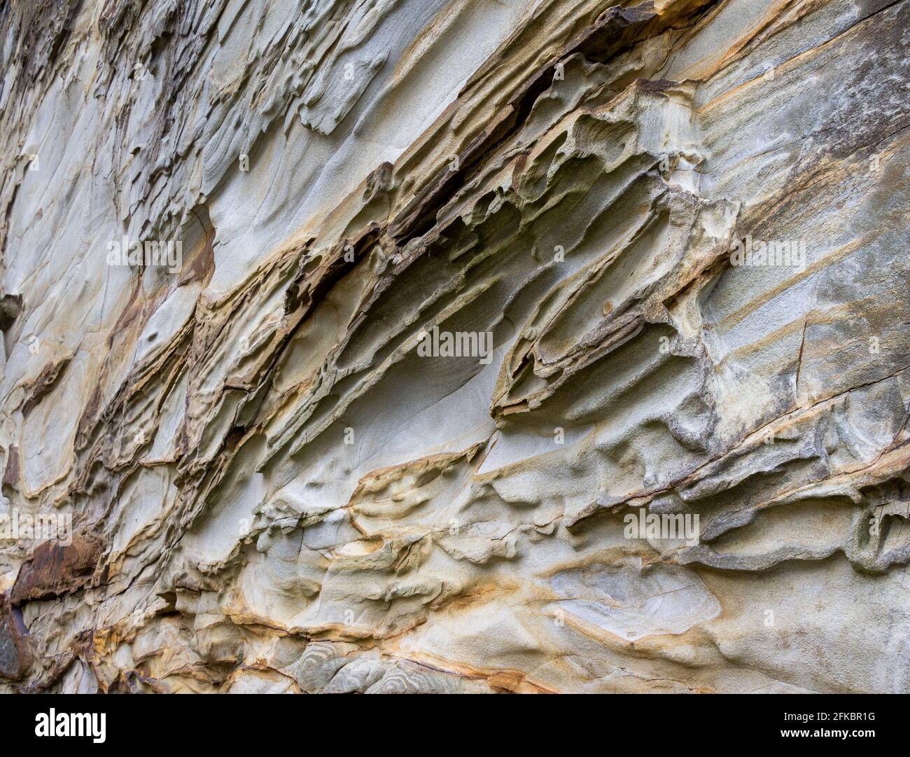 Wind erosion on sandstone cliff Stock Photo - Alamy