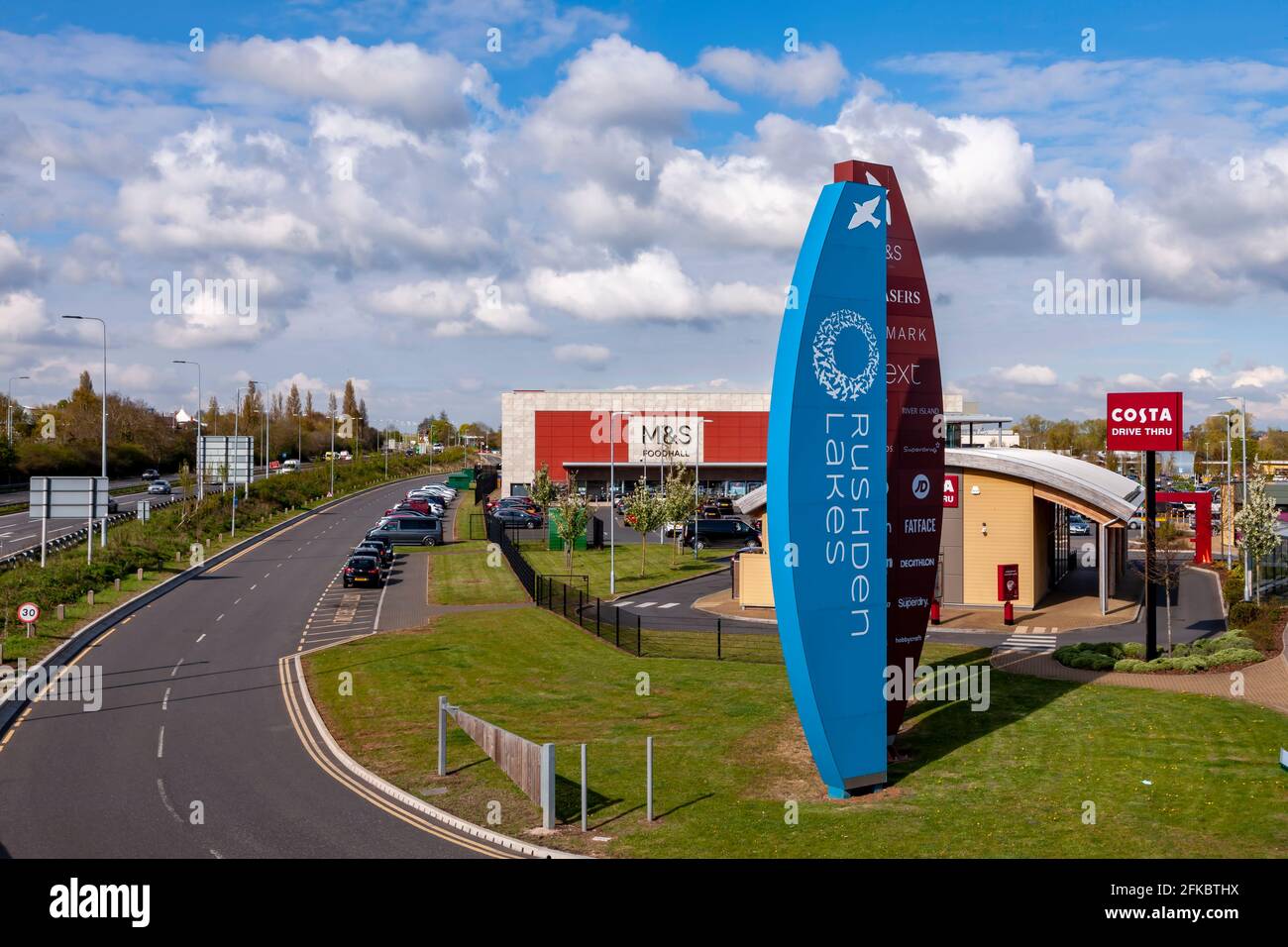 View from the Suspension footbridge over the A45 at Rushden Lakes ...