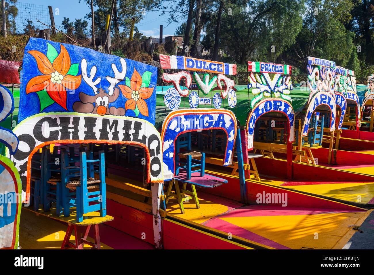 Colourful boats on the Aztec canal system, UNESCO World Heritage Site ...