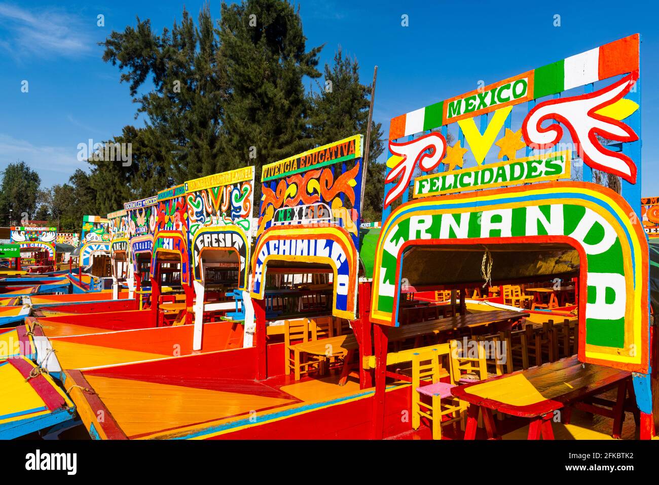 Colourful boats on the Aztec canal system, UNESCO World Heritage Site ...