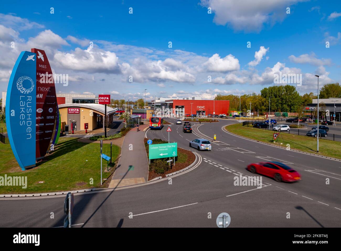 View from the Suspension footbridge over the A45 at Rushden Lakes ...