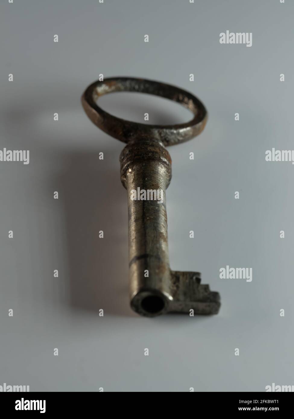 A golden key isolated on white background. Old rusty door key. Antique ...