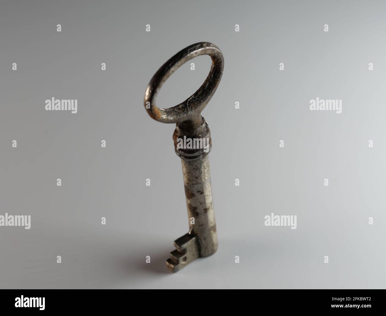 A golden key isolated on white background. Old rusty door key. Antique ...