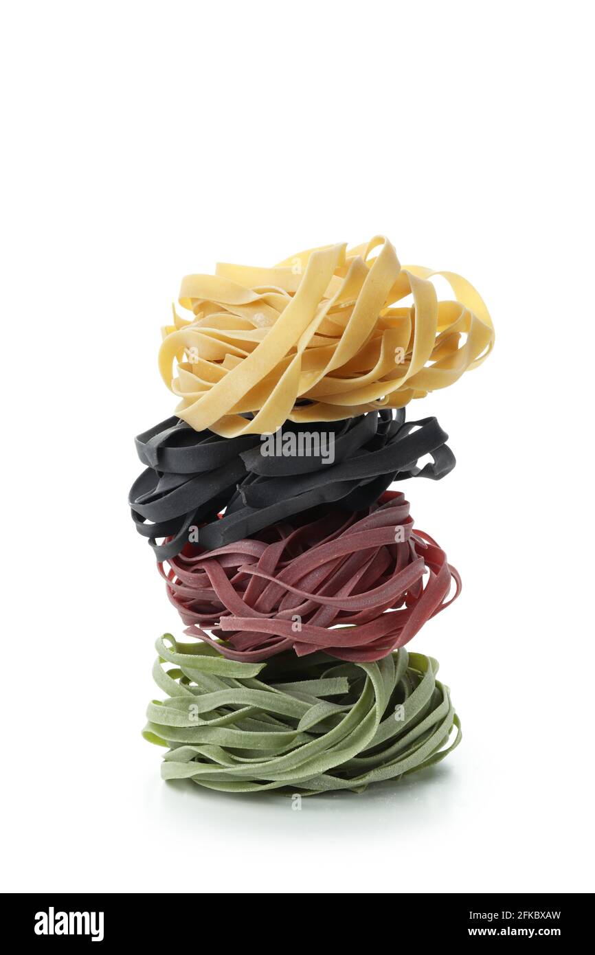 Uncooked color pasta isolated on white background Stock Photo - Alamy