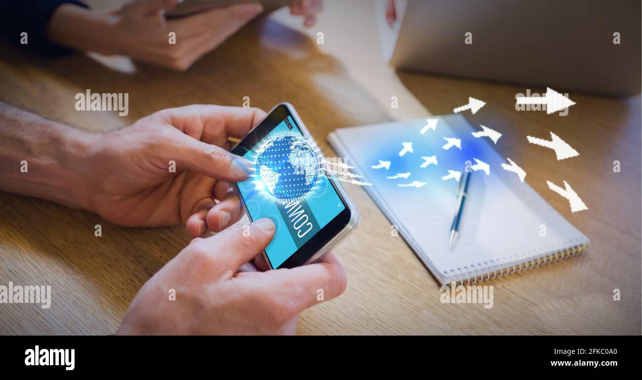 Graphic of globe and arrows over close up of person using smartphone ...