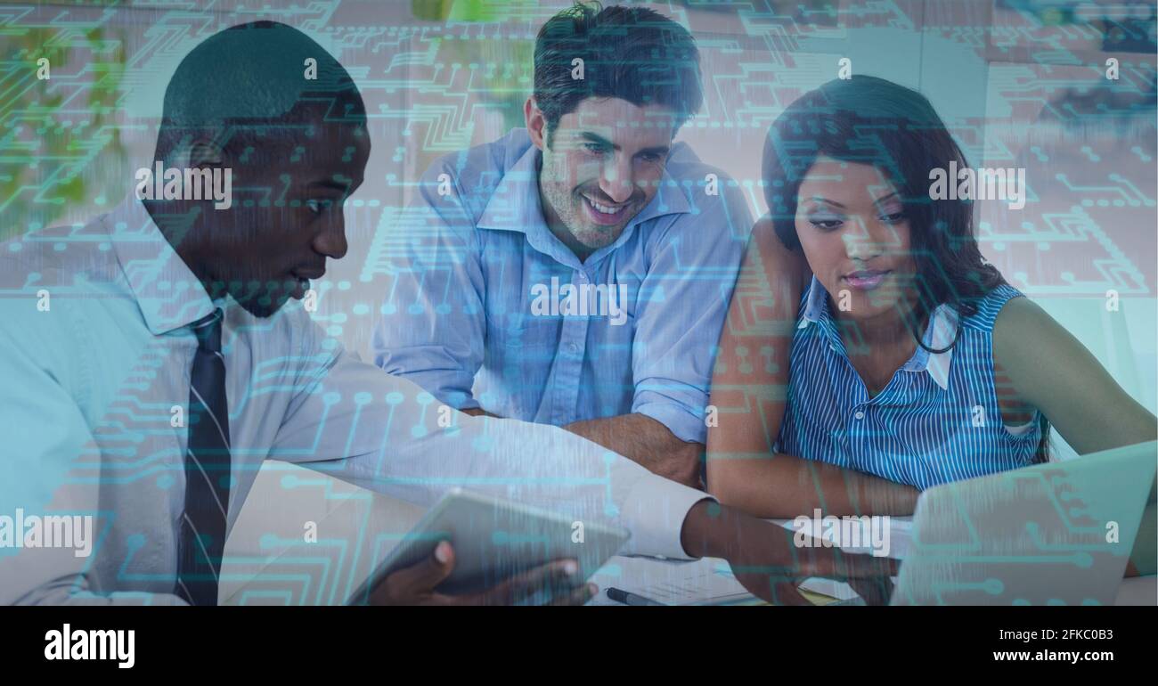 Composition of computer processor over business people using laptop ...