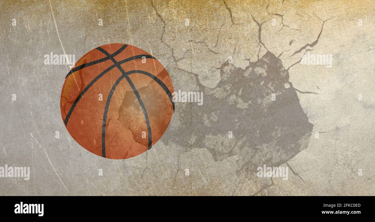 Composition of basketball in air over cracked distressed surface Stock ...