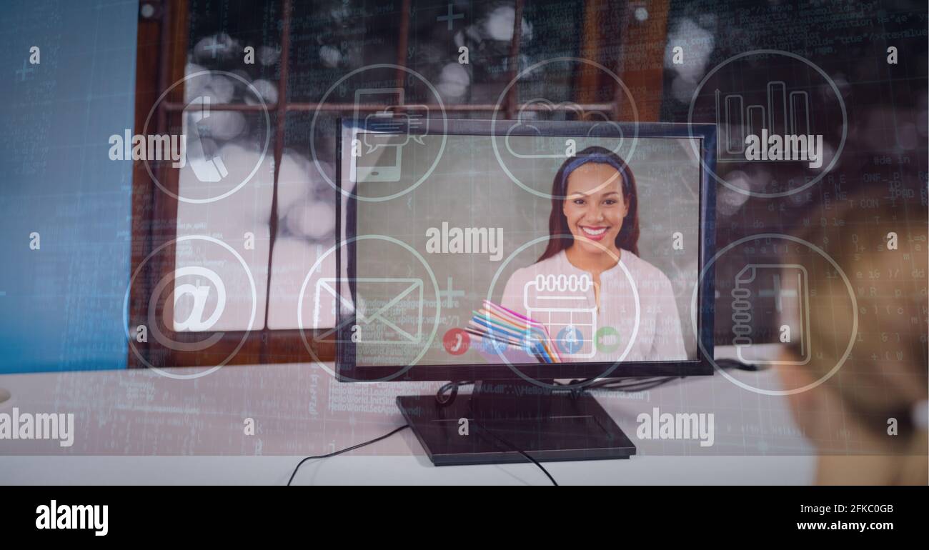 Composition of network of icons over businesswoman on computer video ...