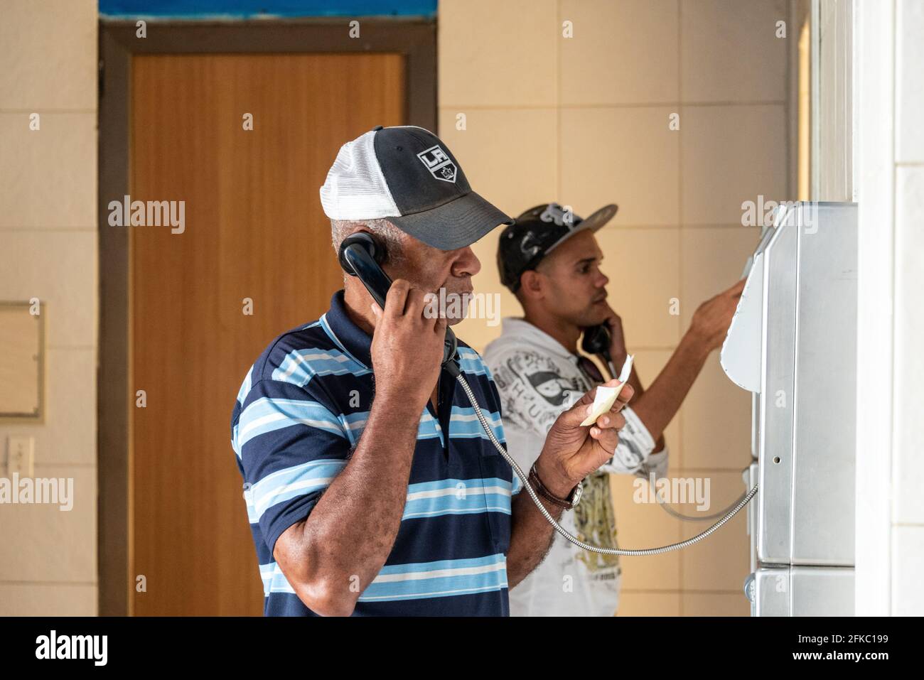 People using payphones hi-res stock photography and images - Alamy