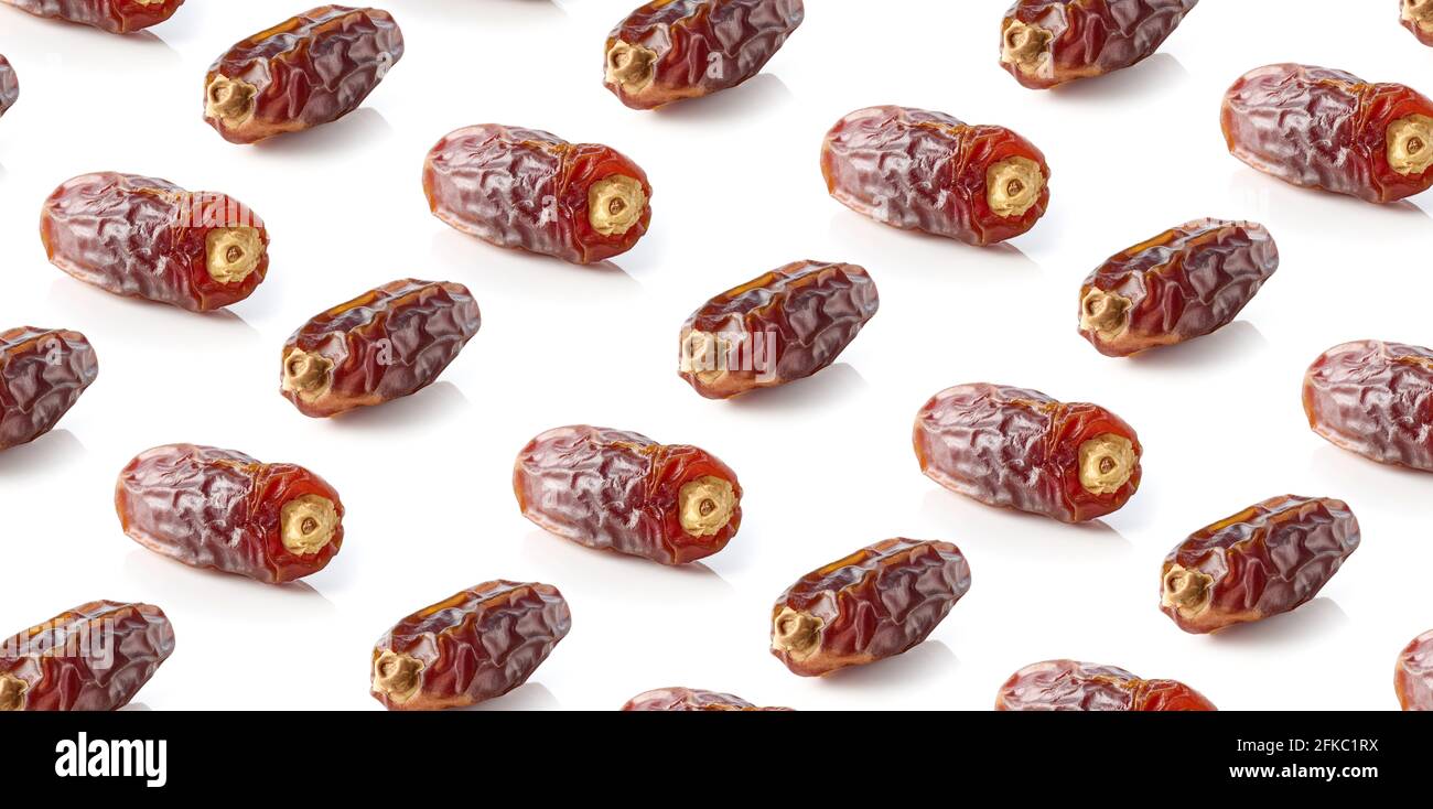 Dried date pattern isolated on white background, top view Stock Photo ...