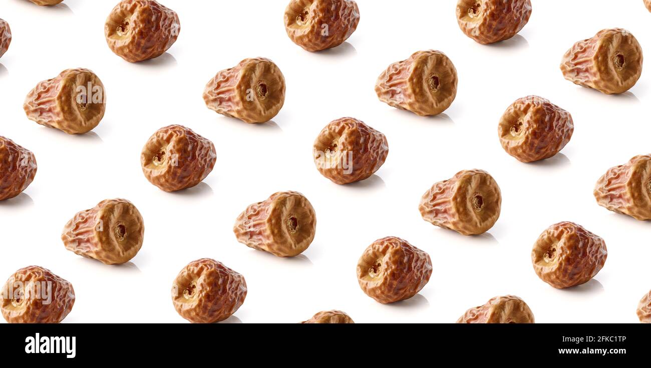 Dried date pattern isolated on white background, top view Stock Photo ...