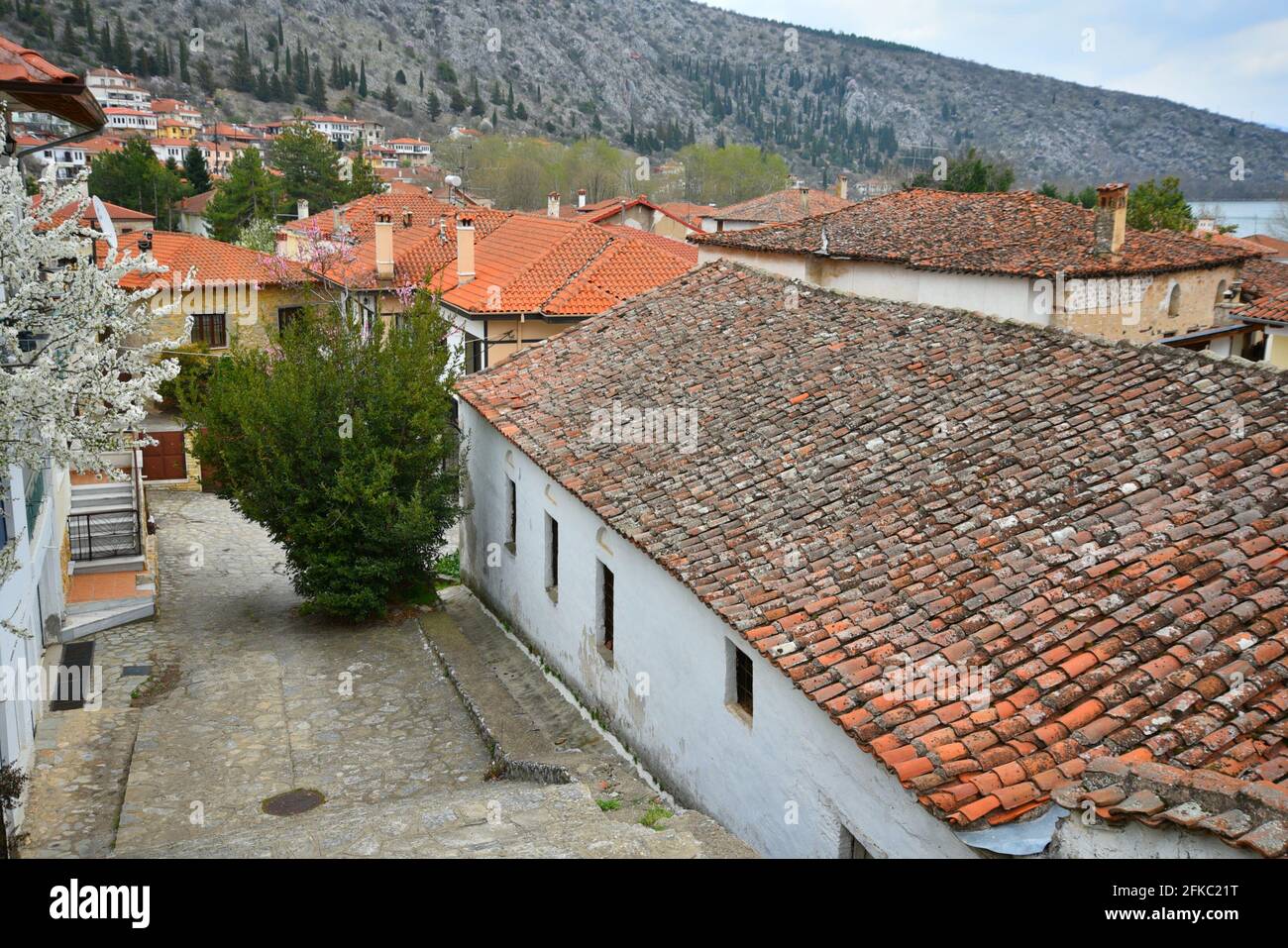 Old traditional rural houses with clay tile rooftops in the multi ...