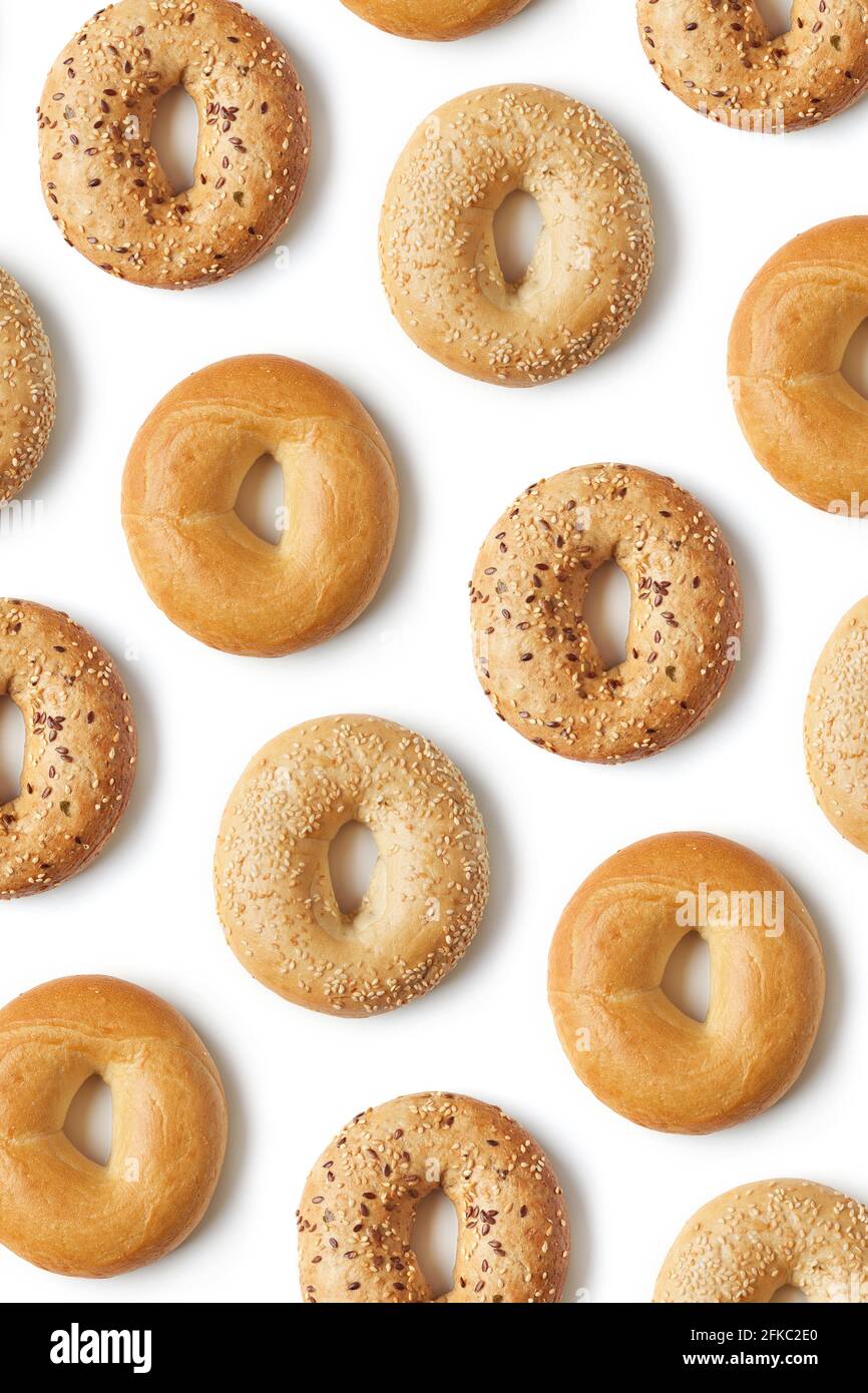 Vertical fresh bagel pattern isolated on white background, top view ...