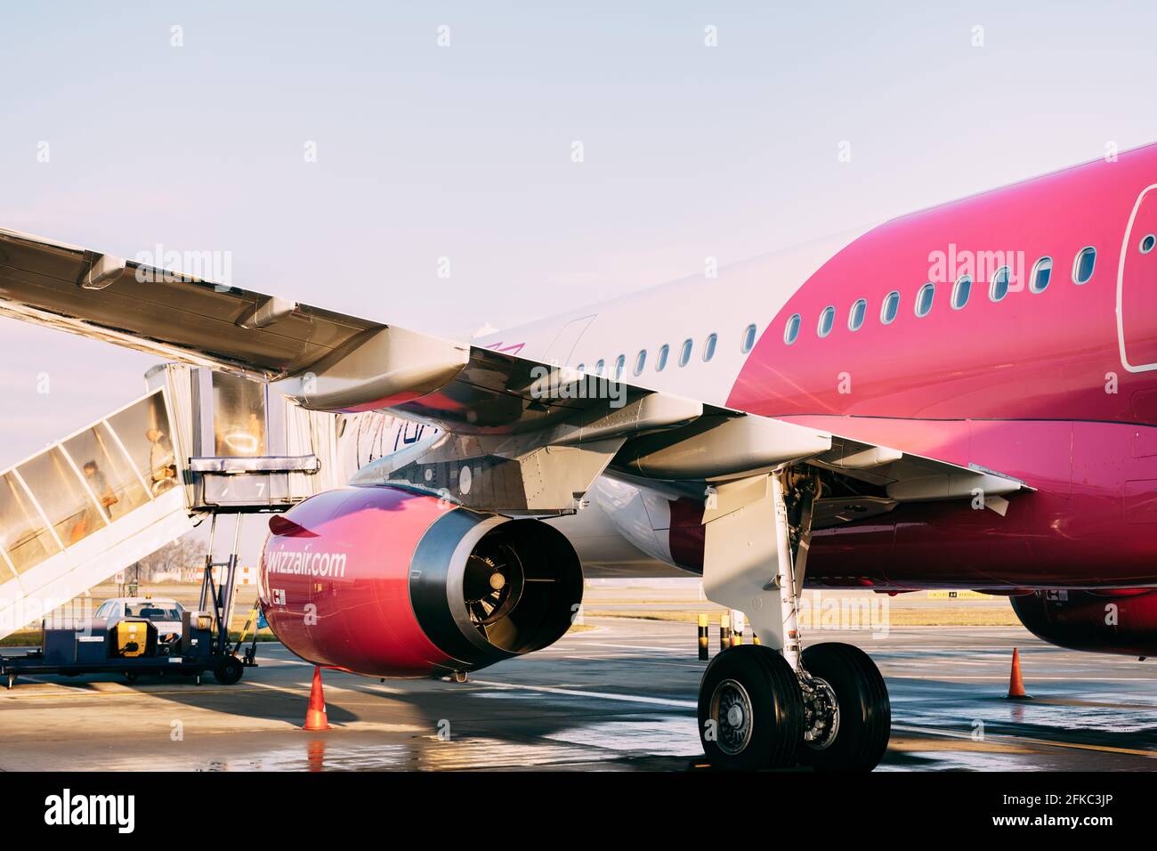 Wizzair plane on a takeoff strip at the airport. Close-up of an ...