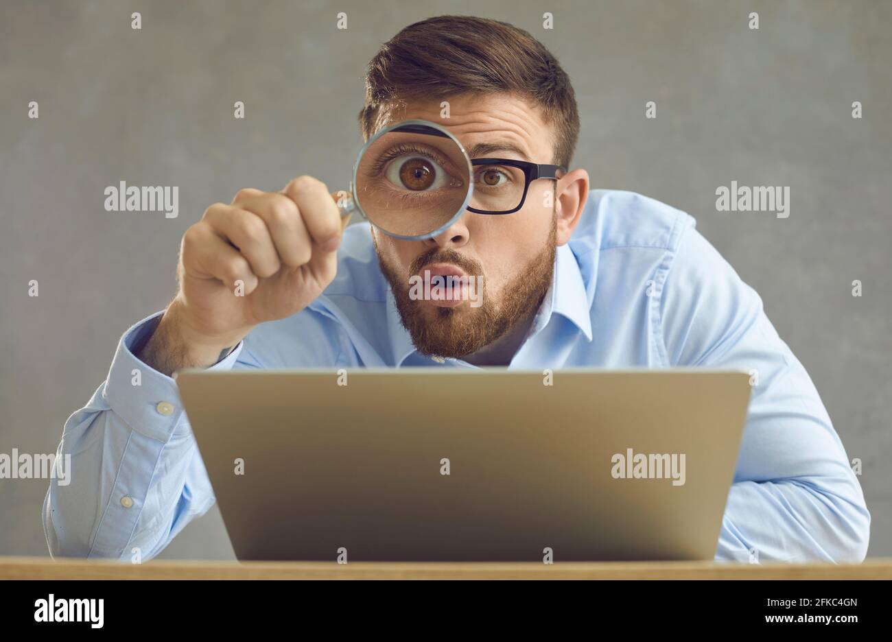 Businessman using magnifying glass hi-res stock photography and images ...